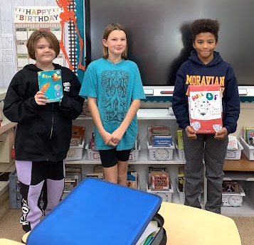 Fifth Grade Serves Cereal Book Reports